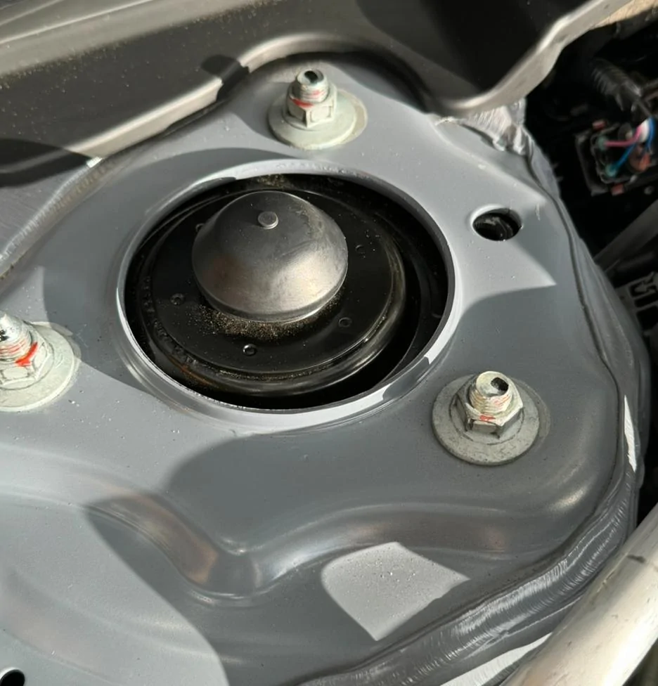 Missing hardware in strut tower after lowering springs install ...